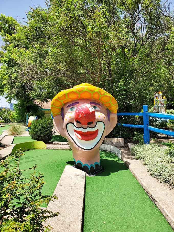Nothing says "trust me with your golf ball" quite like a giant clown head grinning at you mid-putt.