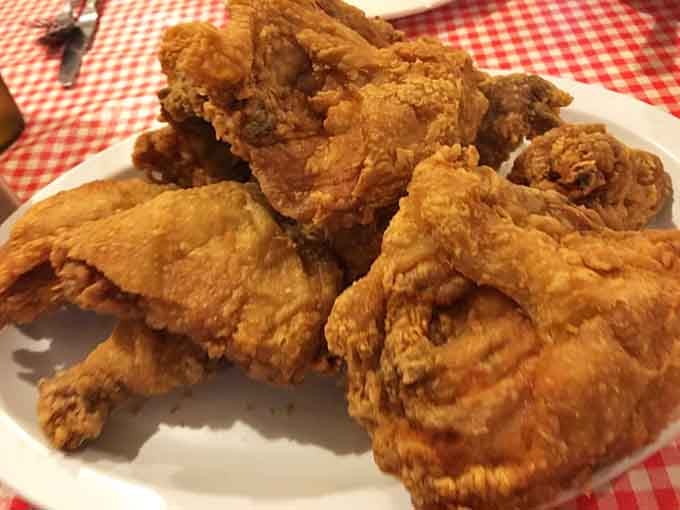Golden, crispy, and glistening with promise, this fried chicken looks like it could solve all your problems, or at least make you forget them.