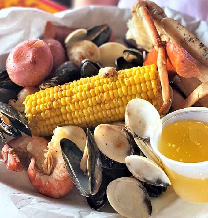 A seafood boil so colorful and abundant, it looks like the ocean threw you a party.