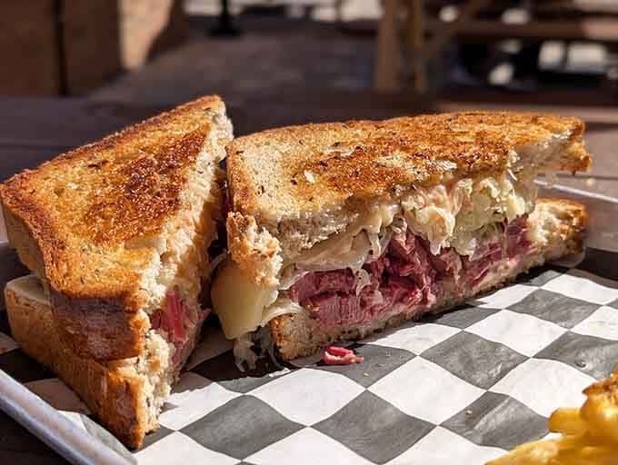 Behold the Reuben in all its glory, stacked higher than your expectations and twice as satisfying.