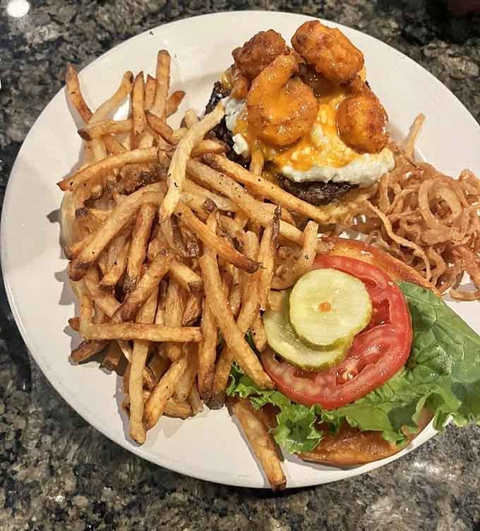 Buffalo fried shrimp piled high on a burger with hand-cut fries is the kind of indulgence worth writing poetry about.