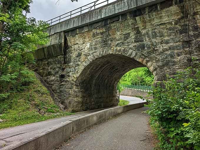 Stone arch bridges built when craftsmanship mattered more than construction timelines, still standing strong after generations.