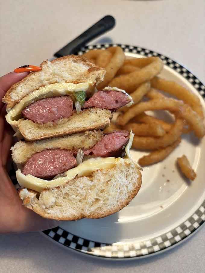 That smoked sausage sandwich means business, arriving with enough substance to fuel your entire afternoon and then some.