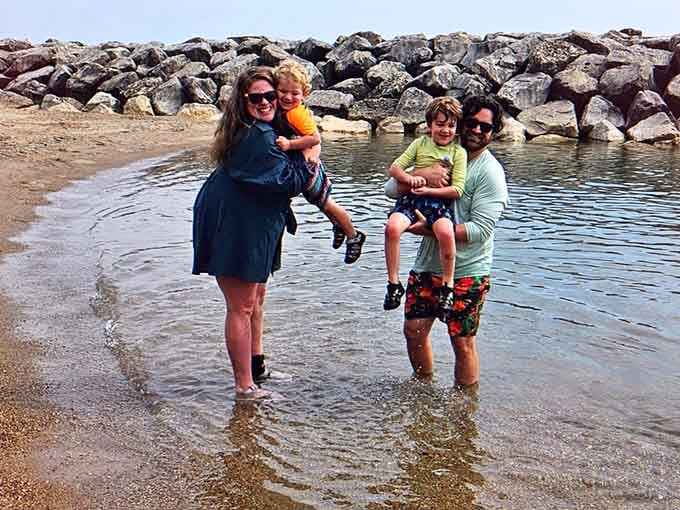 Families wading in the protected shallows, creating those simple summer memories that somehow last a lifetime.
