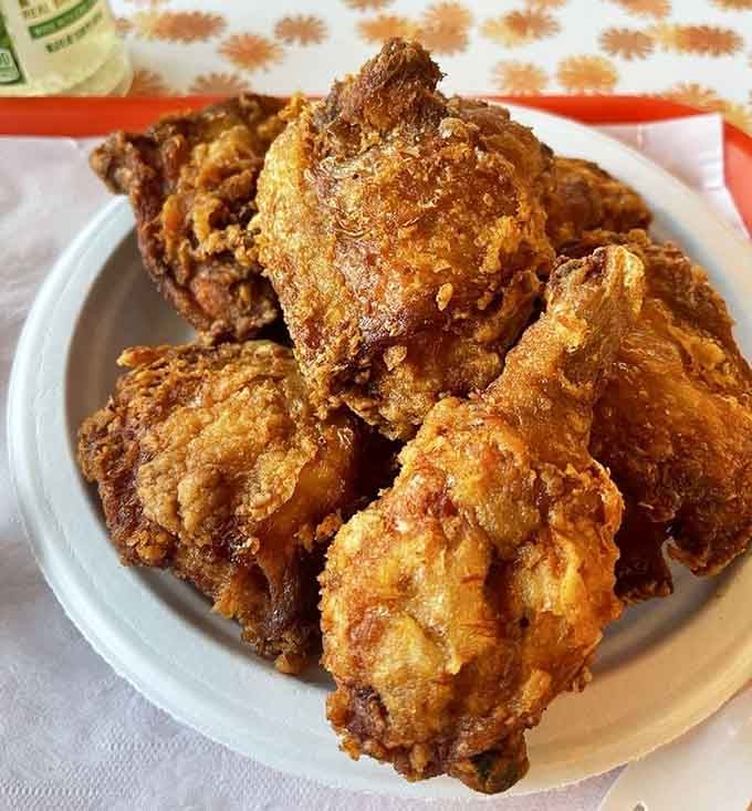 Golden, crispy, glistening perfection that makes you understand why people drive from three counties away for this.