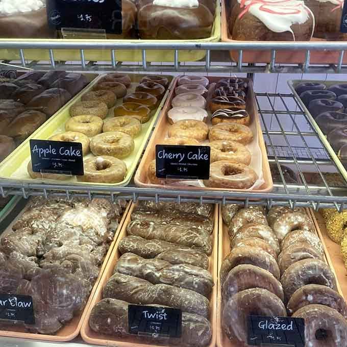 Donuts arranged like edible art, proving that sometimes the simplest pleasures are the most spectacular ones.