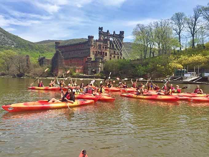When the whole crew raises their paddles in triumph, you know you've found something worth celebrating together.