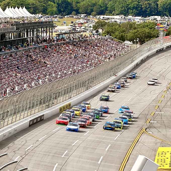When forty cars thunder past at nearly 200 mph, your chest becomes a secondary speaker system, free of charge.