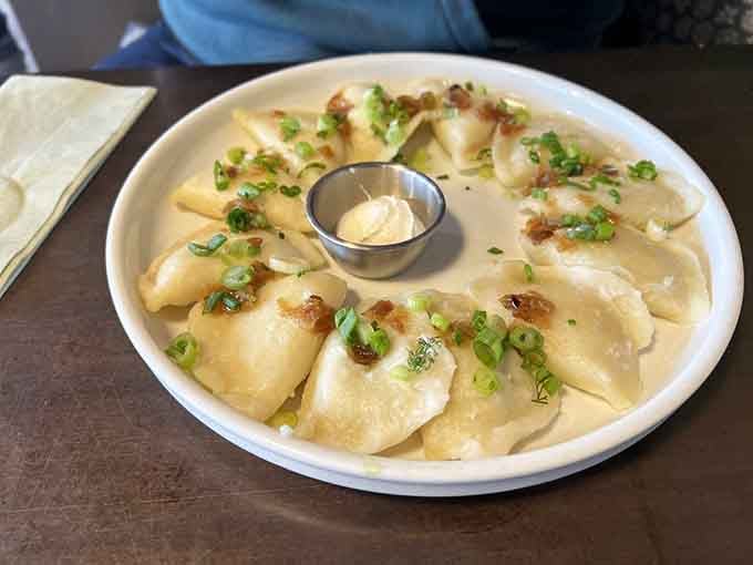 Golden, pillowy perfection arranged like edible art, each pierogi handmade and ready to change your life.