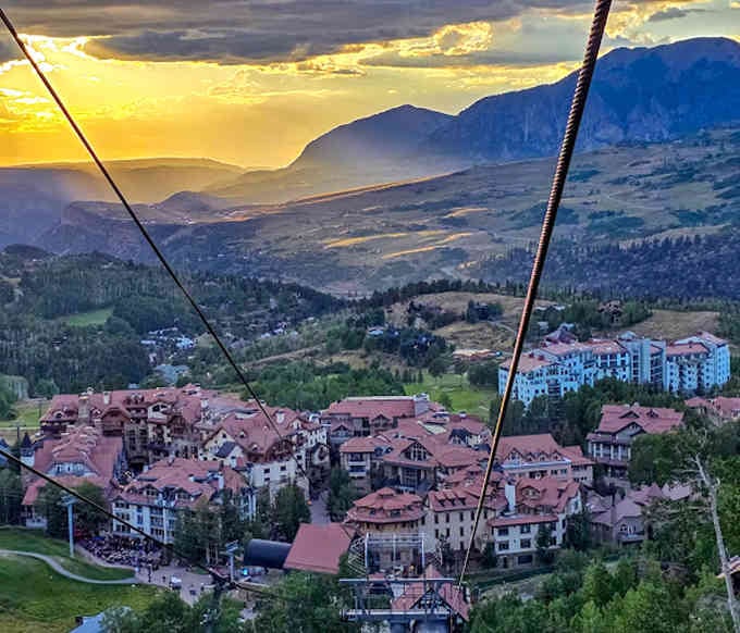 Sunset from the gondola turns Mountain Village into liquid gold, proving nature has excellent taste in lighting.