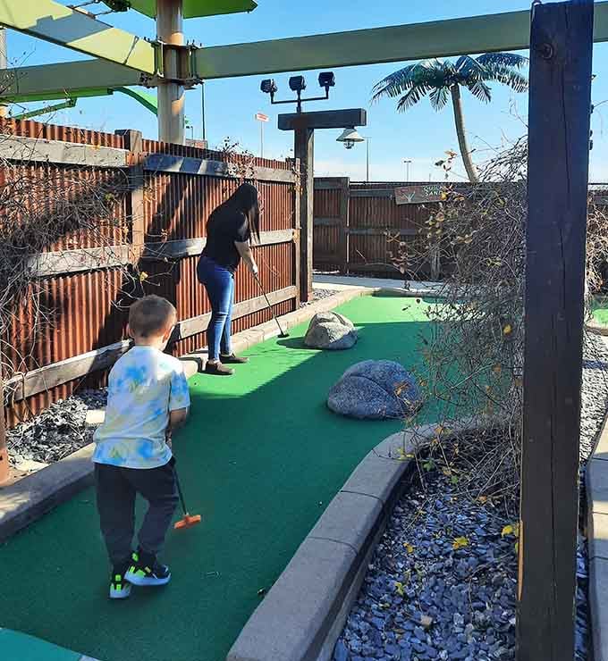 Mini golf with a volcano that actually erupts, making your local putt-putt course look tragically understated by comparison.