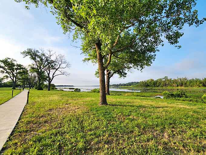 The open parkland surrounding the lake offers perfect picnic spots with million-dollar views for free.