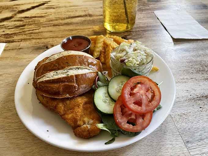 Golden, crispy schnitzel on a pretzel bun with all the fixings proves that sometimes fusion food absolutely nails it.