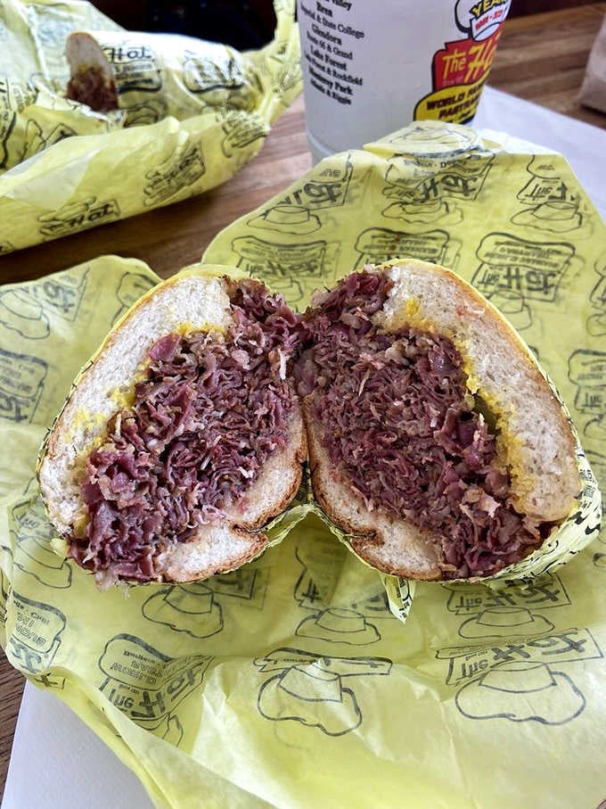 Behold the pastrami dip in all its glory, proof that some sandwiches require architectural planning before eating.