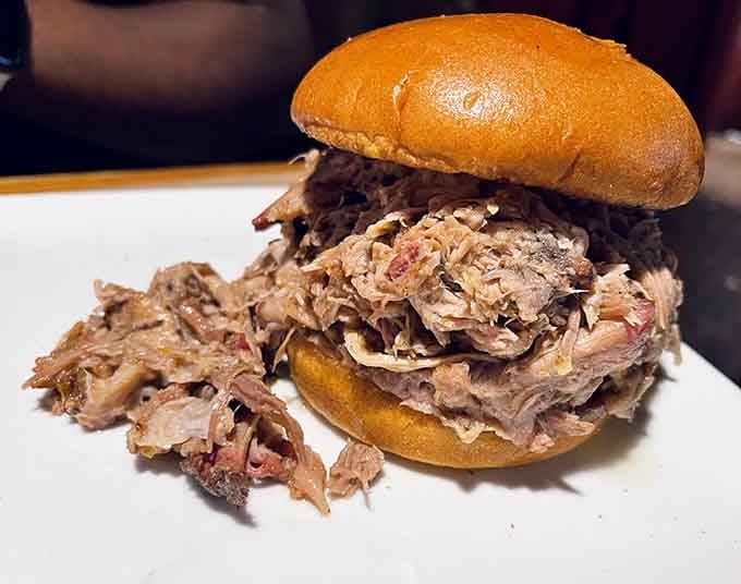 Pulled pork piled this high should probably require an engineering degree to eat properly.