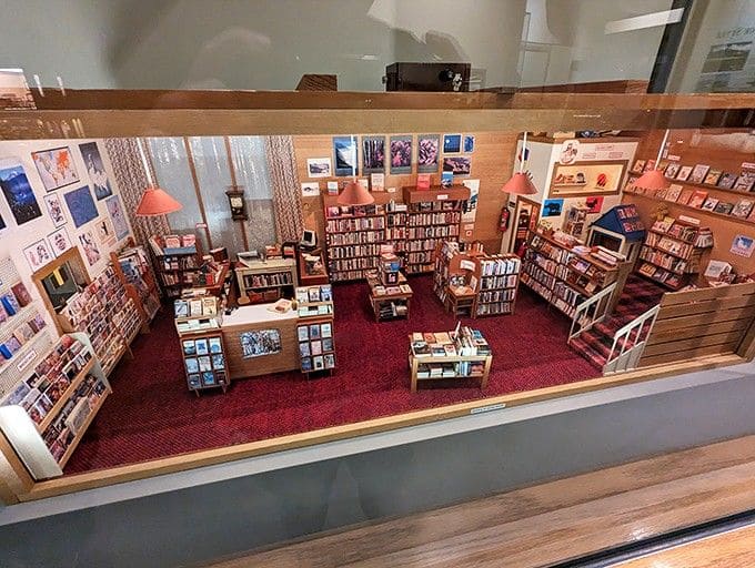 A miniature bookstore so detailed, you can practically smell the tiny leather-bound volumes on those shelves.