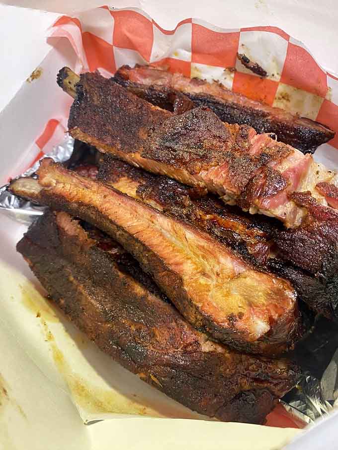 Ribs with a bark so perfect they look like they belong in a barbecue hall of fame somewhere.