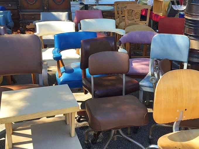 This rainbow coalition of chairs looks like a furniture store exploded in the best possible way.