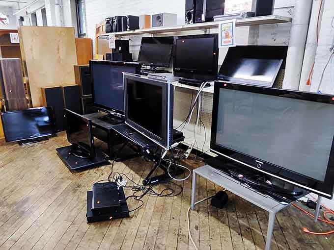 Flat screens lined up like eager contestants, each one hoping you'll take them home for movie night.