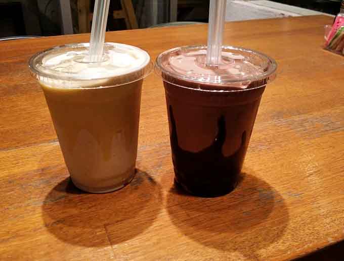 Two shakes sitting side by side like old friends, each one thick enough to require serious straw commitment.