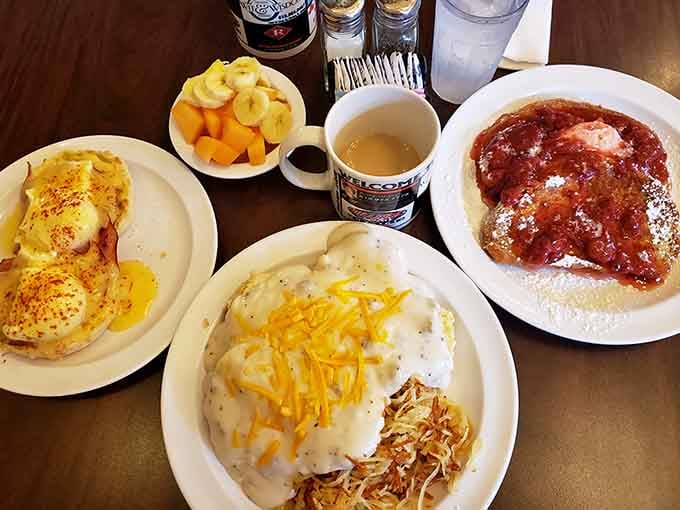 A table full of homestyle breakfast classics that prove sometimes the best things in life are served on white plates.