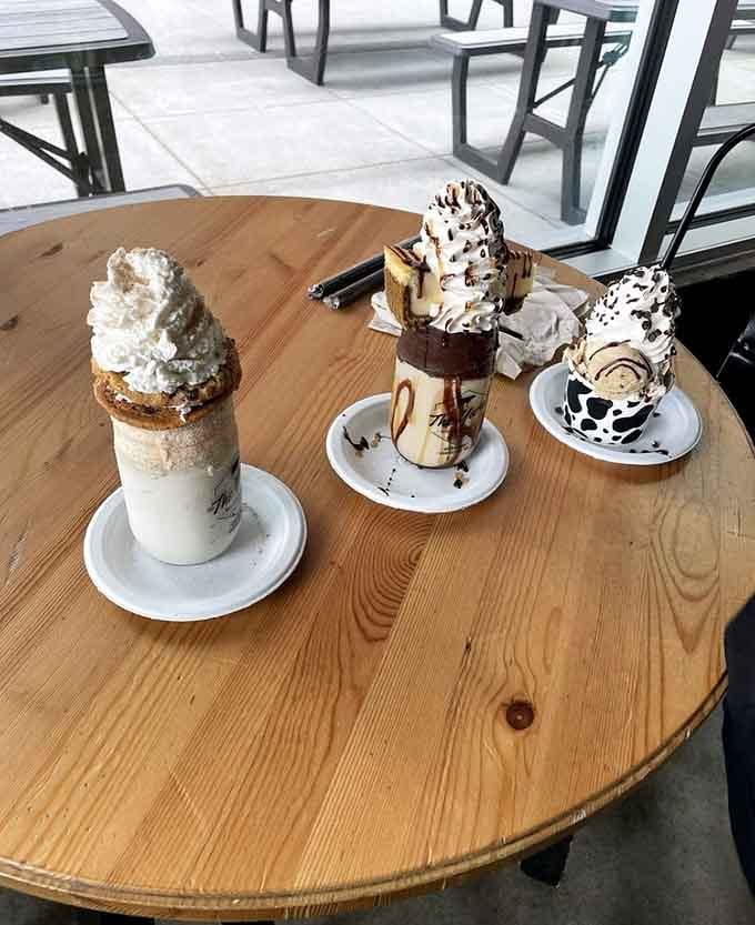 Three towering creations sharing one table, proof that good things really do come in threes.