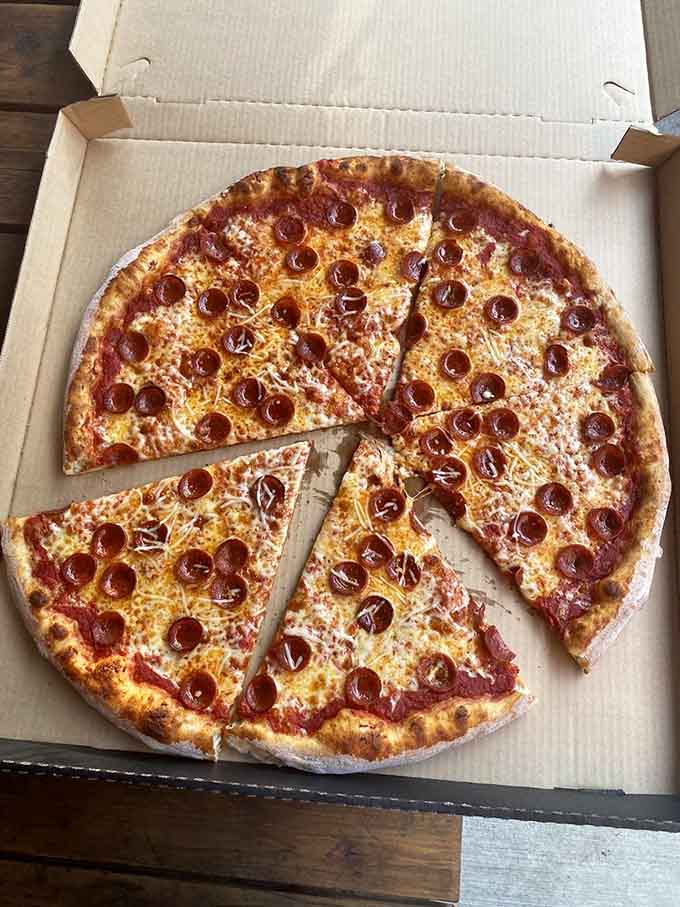 This pepperoni pizza proves that sometimes the classics don't need improvement, just proper execution and generous cheese coverage.