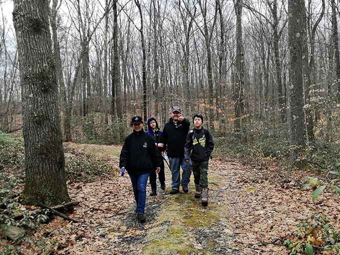 Nothing says "we found the good stuff" quite like a group of hikers who've clearly discovered Connecticut's secret garden.