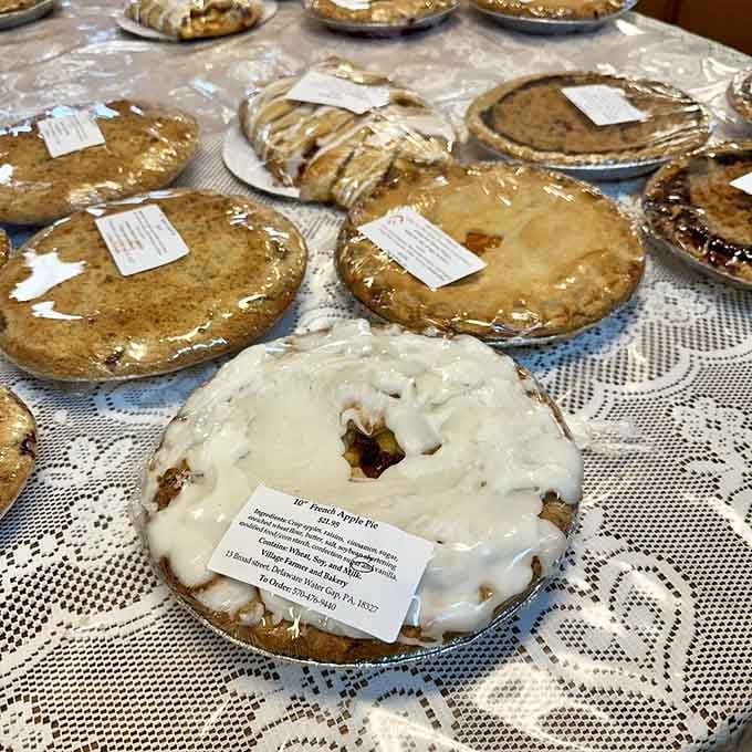 A table full of homemade pies that could make even the most disciplined person abandon all self-control.