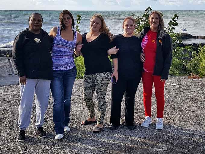 Families gathering at the lake's edge, creating memories that don't require a passport or second mortgage to afford.