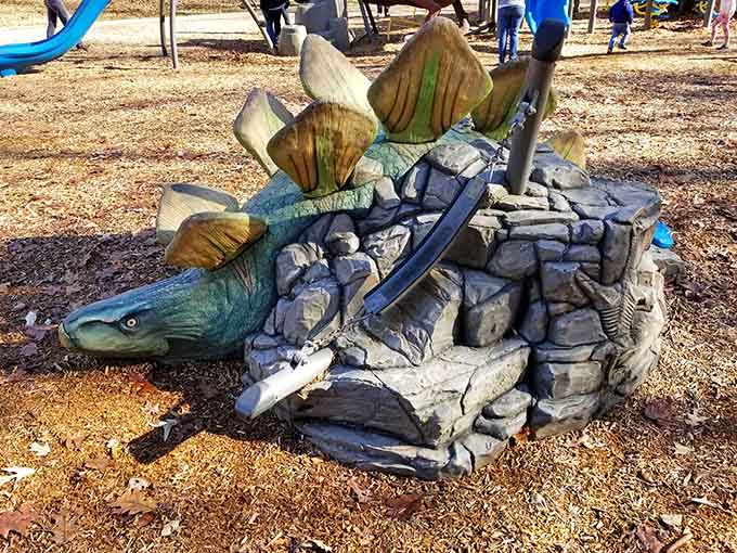 This armored friend looks ready to teach geology lessons while kids scramble across his textured back and fins.