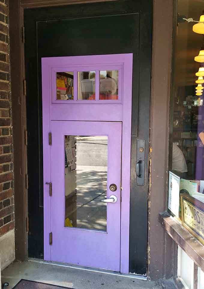 This lavender portal is sized for kids, reminding adults that sometimes you need to stoop to enter paradise.