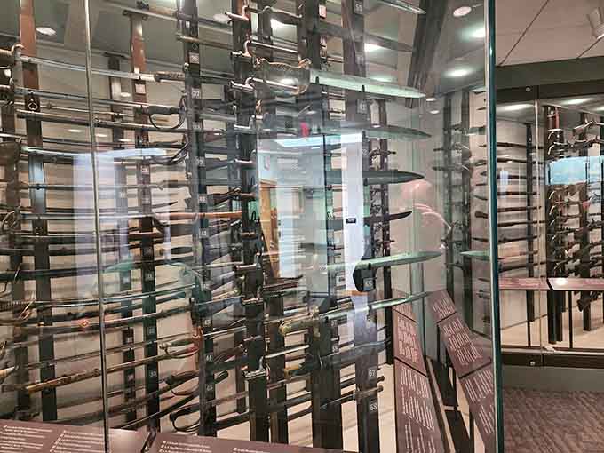 This weapons display showcases the tools of 1861 warfare in all their sobering, gleaming reality.
