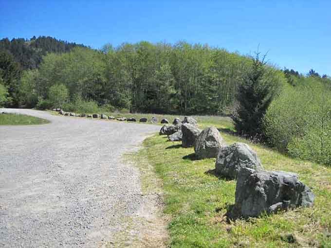 Those rocks lining the entrance aren't just decoration; they're nature's way of saying "slow down, you've arrived at tranquility."