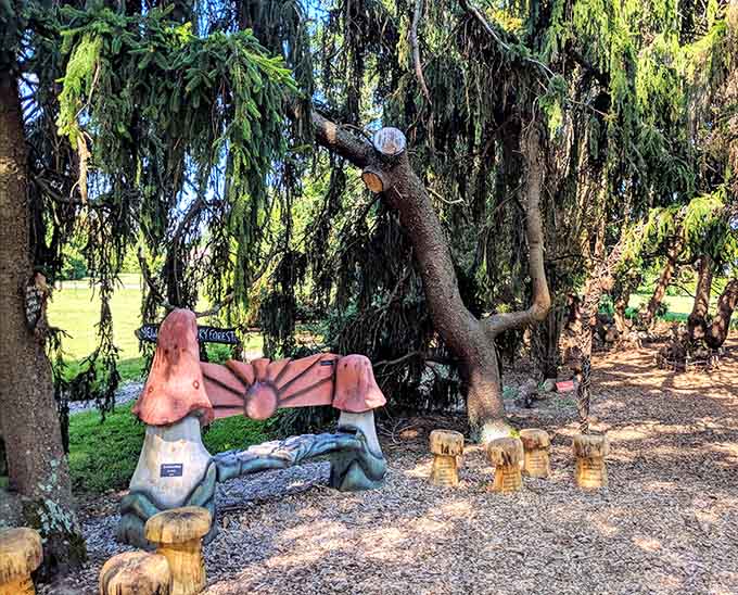 Even the garden gnomes get front-row seats to nature's show under these gorgeous weeping branches.