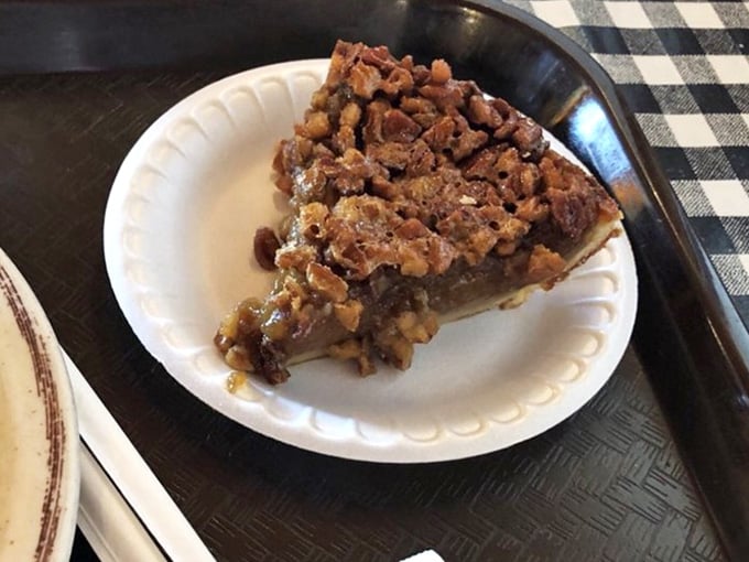 Pecan pie loaded with nuts and gooey filling. This is what Southern baking dreams are made of, friends.