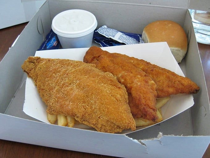 Golden, crispy catfish that proves seafood and rib shacks can absolutely coexist in perfect harmony on one menu.