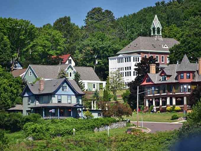 Victorian homes cascade down Bayfield's hillside toward Lake Superior, each one painted brighter than your grandmother's favorite Sunday dress.