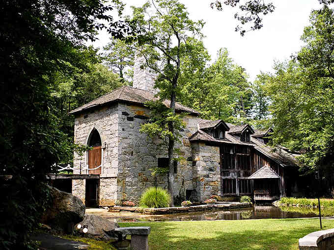 This woodland castle with its tower and pond looks like Camelot decided to vacation in the Appalachians.