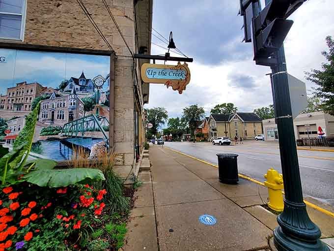 That beautiful mural captures the town's spirit perfectly, while flower boxes add splashes of color that brighten every passing moment.