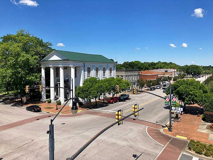 Those grand white columns stand proud over a downtown that proves elegance doesn't require expensive zip codes.