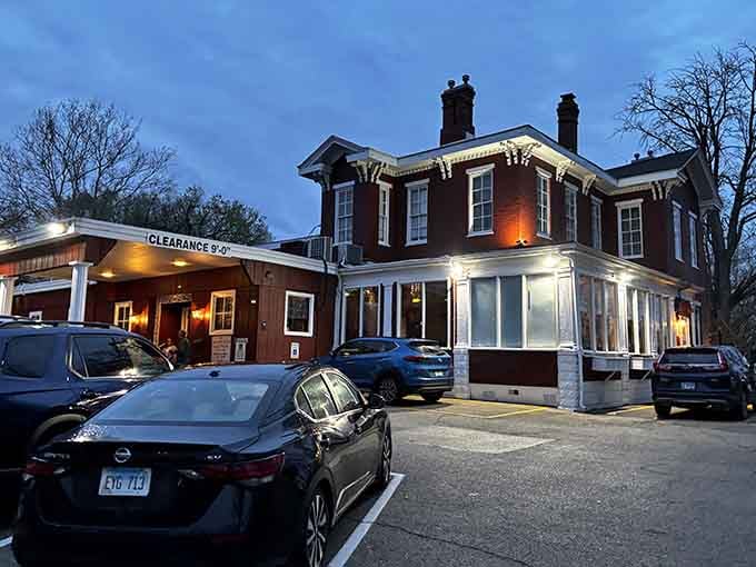 Evening lights glow warmly, beckoning hungry diners to discover why locals keep coming back to this distinctive spot.