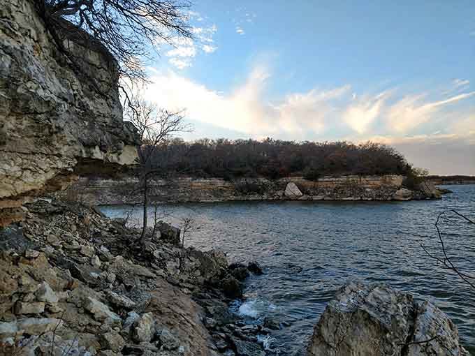 Limestone cliffs frame this hidden cove where the water glows turquoise like something from a postcard.