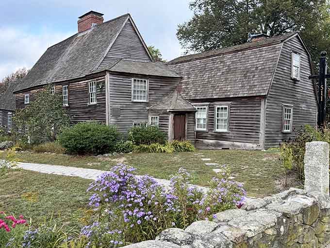 Weathered wood and tiny windows tell stories from when America was just getting started on this very spot.
