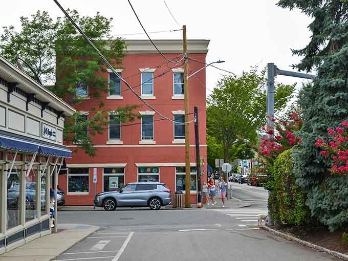 Corner buildings in warm terracotta tones stand where generations have gathered, shopped, and shared the day's news over coffee.