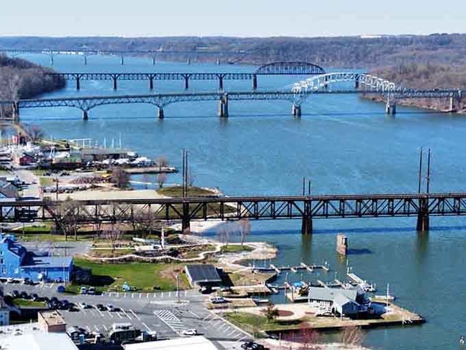 Bridges crossing the river show how communities connect over water, literally bringing people together for generations.