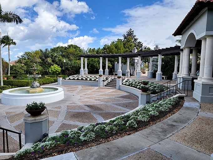 Fountains dance among manicured gardens where Mediterranean elegance meets Florida sunshine in perfect balance.
