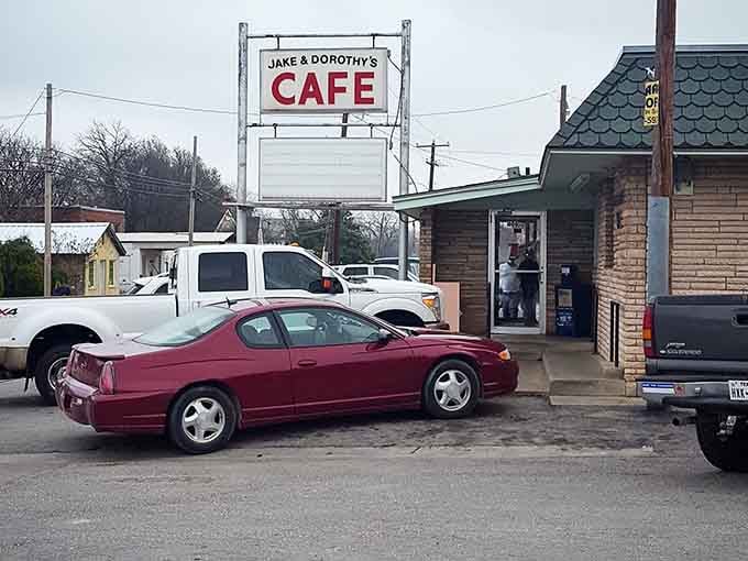 That classic roadside sign stands tall like a beacon guiding hungry travelers to homestyle cooking done absolutely right.