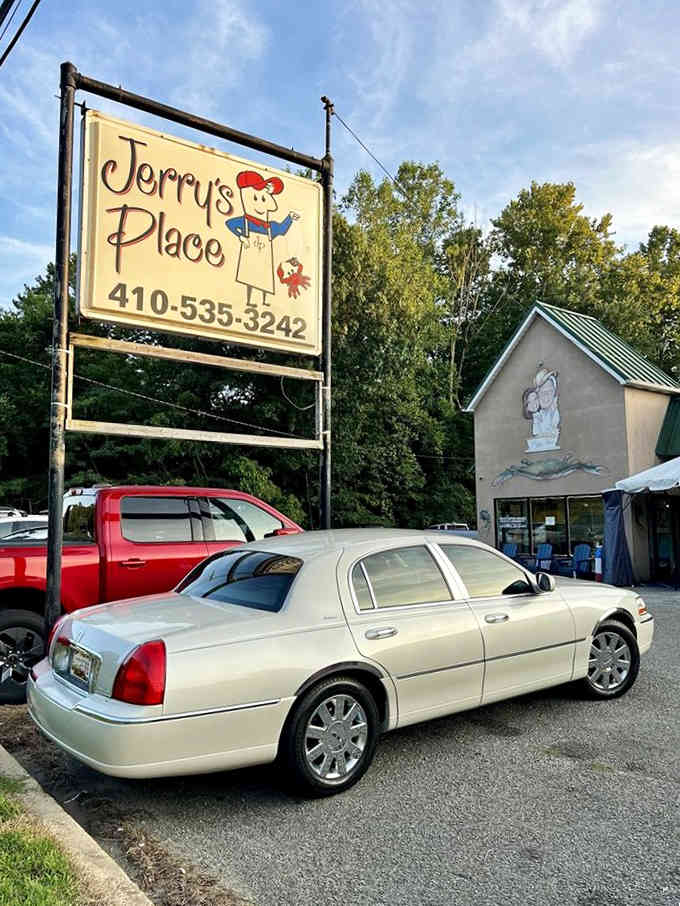 That hand-painted sign with its cheerful cartoon character radiates the kind of warmth that makes every meal feel like home.