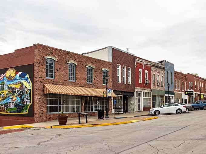 That vibrant mural adds a splash of modern artistry to historic brick, proving old towns can embrace new creativity.